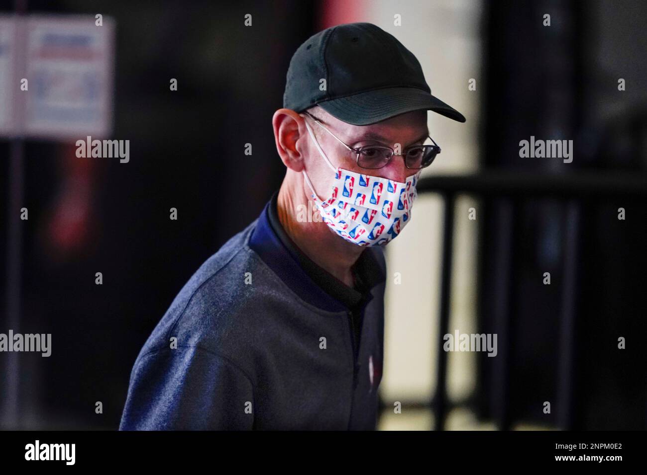 NBA Commissioner Adam Silver attends an NBA basketball game between the ...