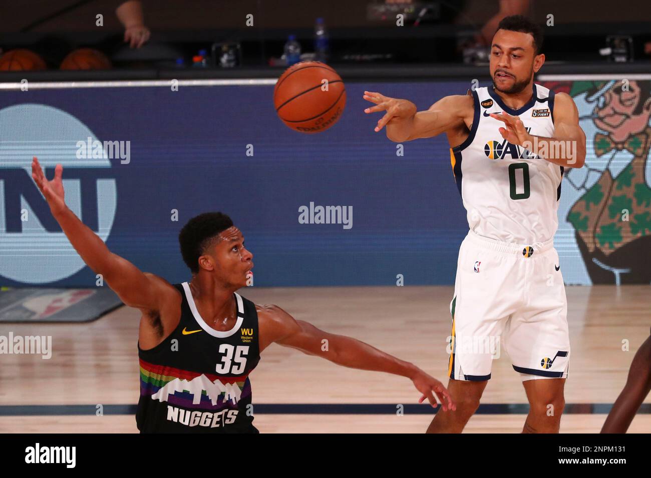 Utah Jazz guard Nigel Williams-Goss (0) passes the basketball against ...