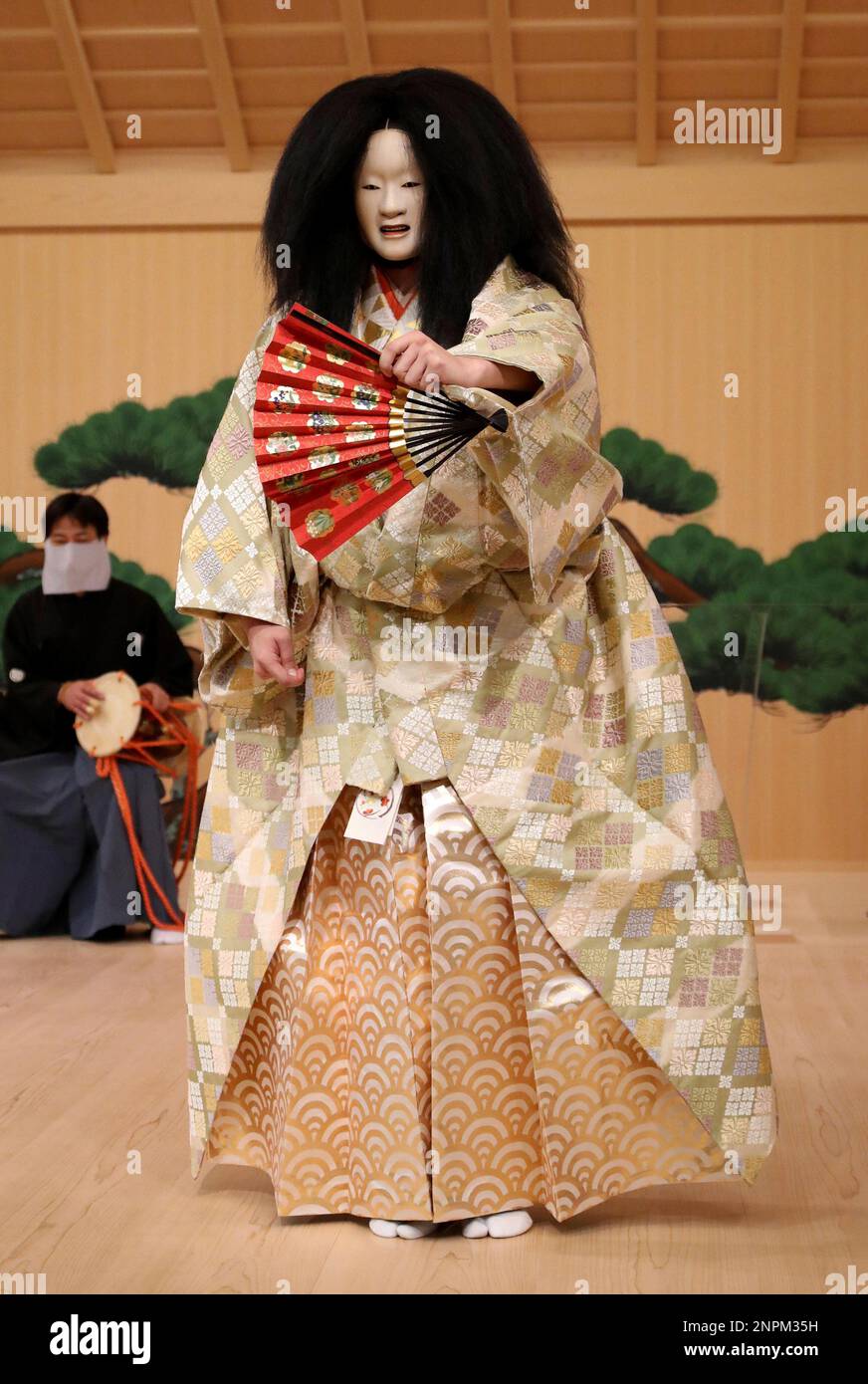 A Noh actor, dressed in Amabie, a legendary Japanese ghost peforms Noh ...