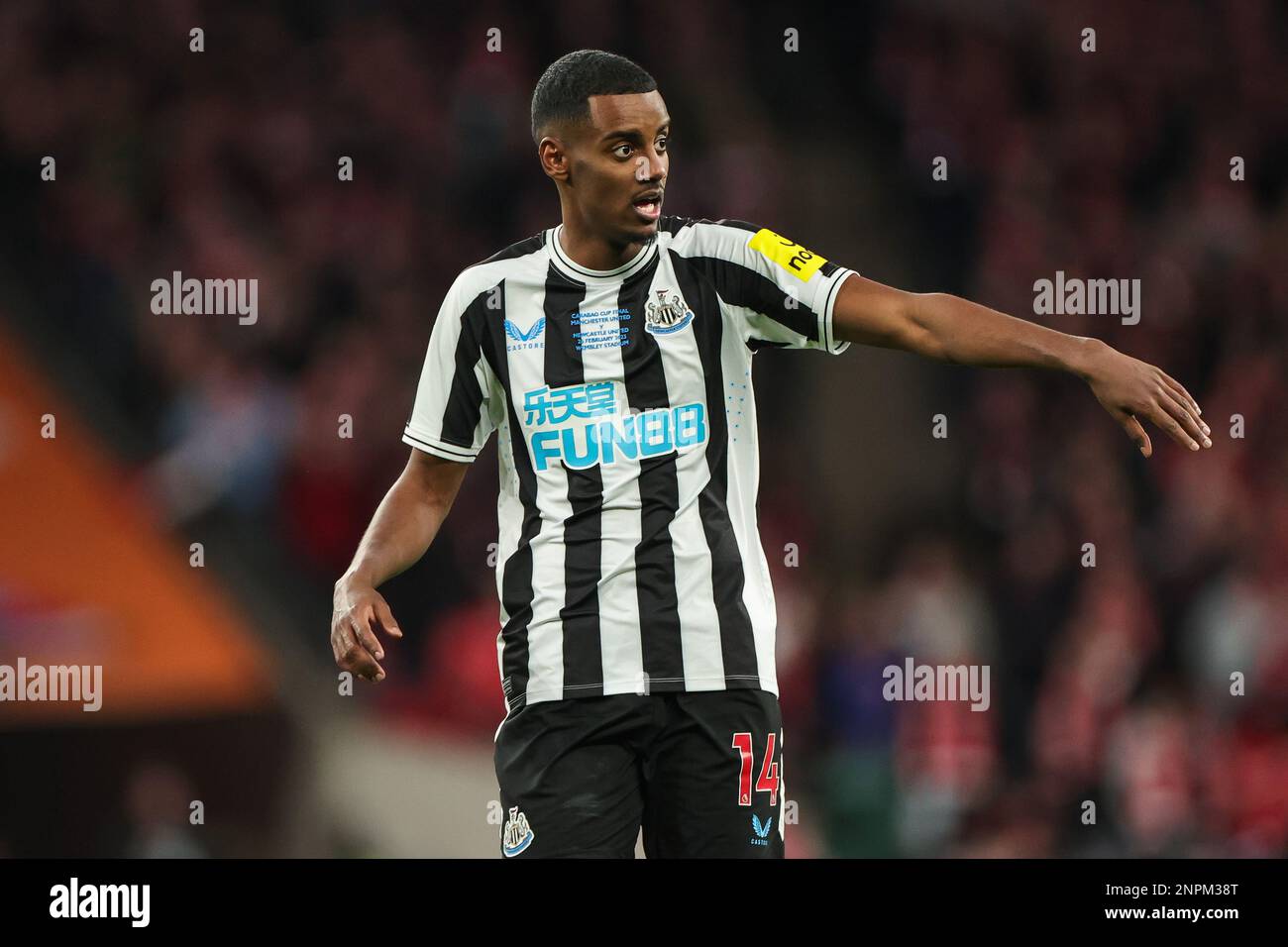 Alexander Isak #14 of Newcastle United gives his team instructions ...