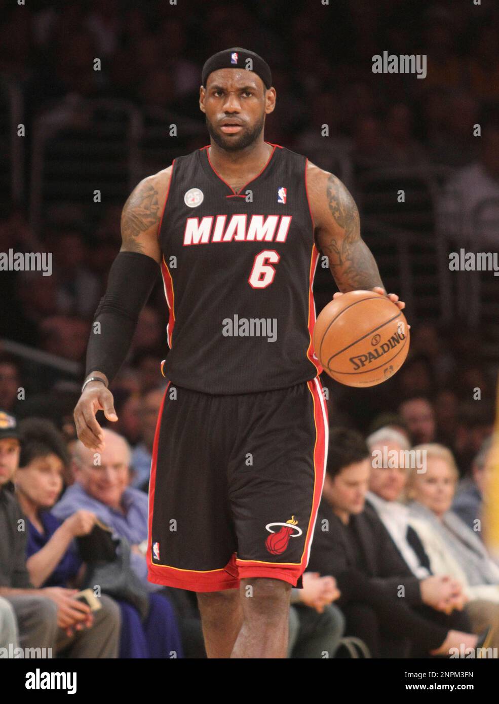 Miami Heat forward LeBron James (6) makes a move with the basketball ...