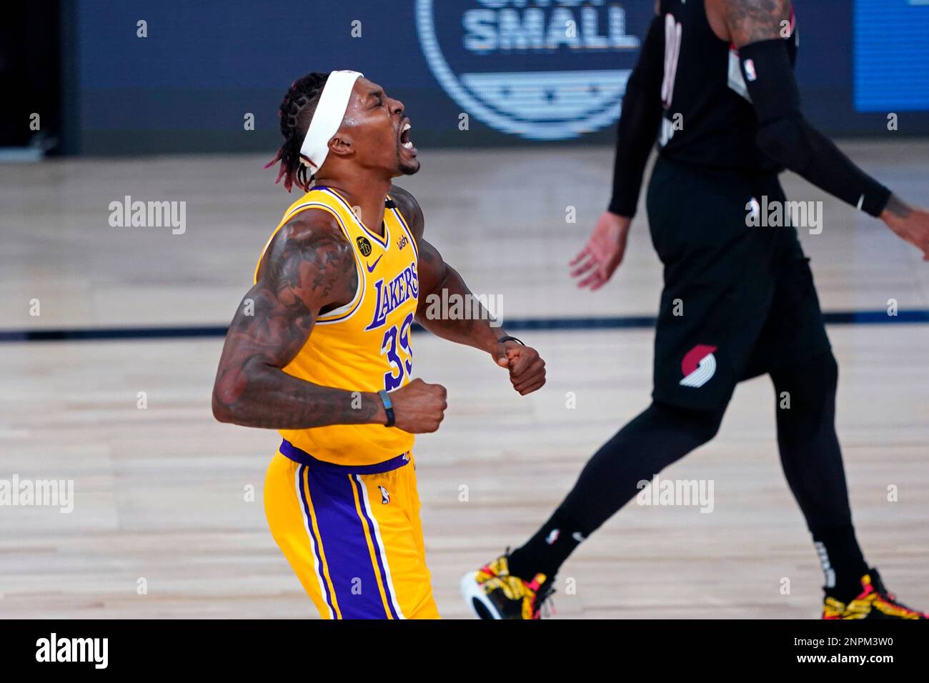 Los Angeles Lakers center Dwight Howard (39) reacts after a slam dunk ...