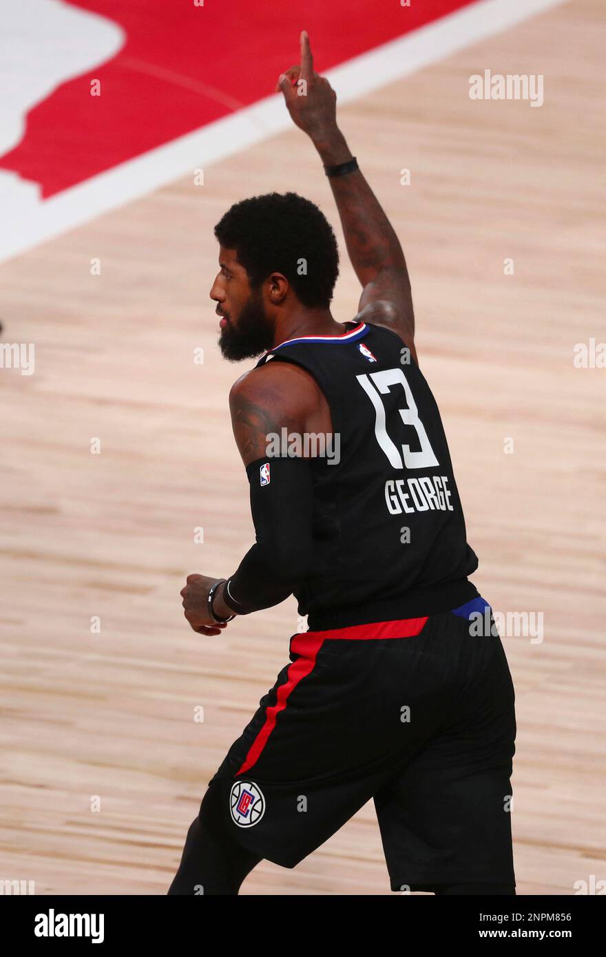 Los Angeles Clippers guard Paul George reacts after making a 3-pointer ...