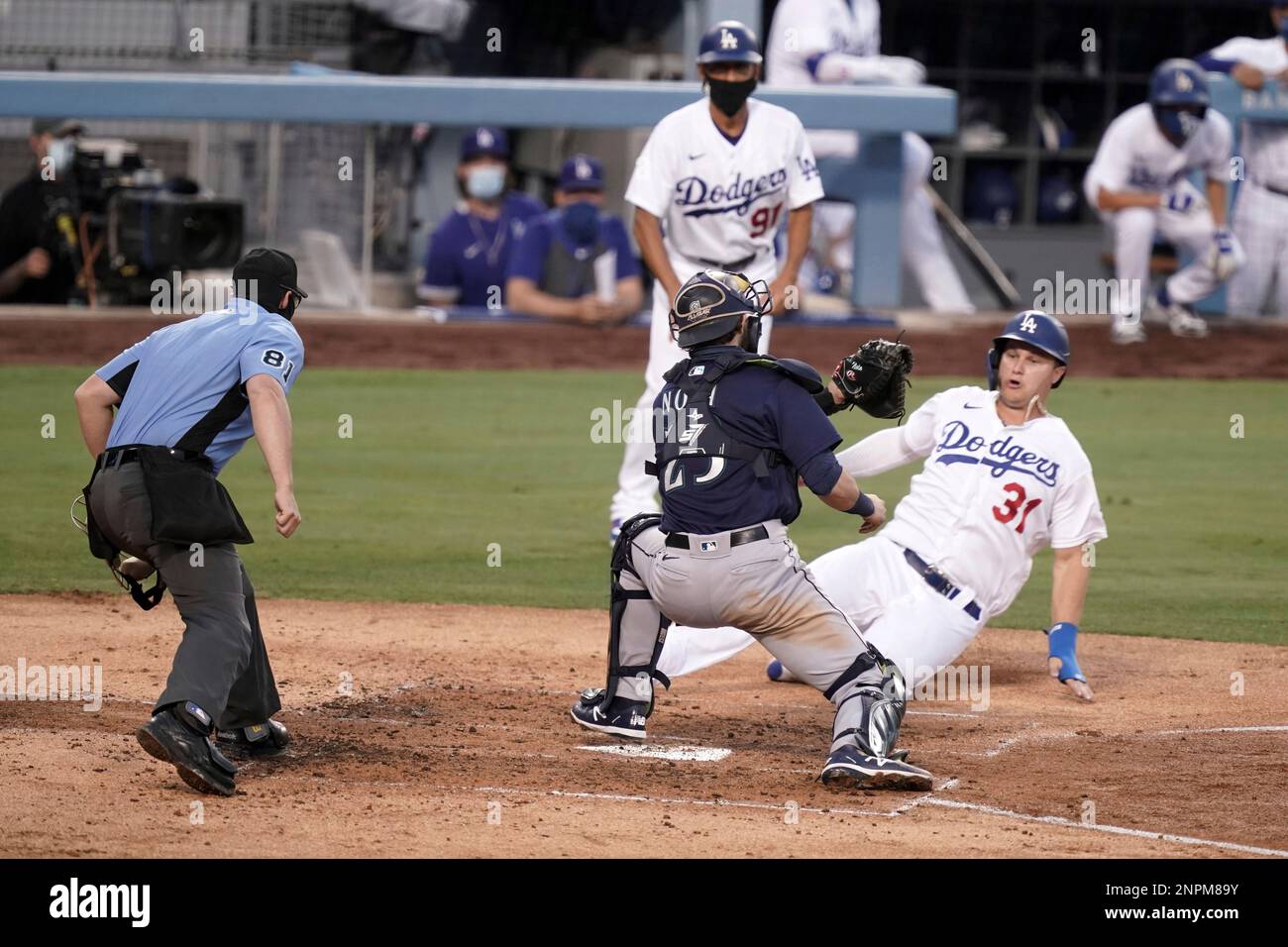Los Angeles Dodgers right fielder Joc Pederson (31) is tagged out at ...