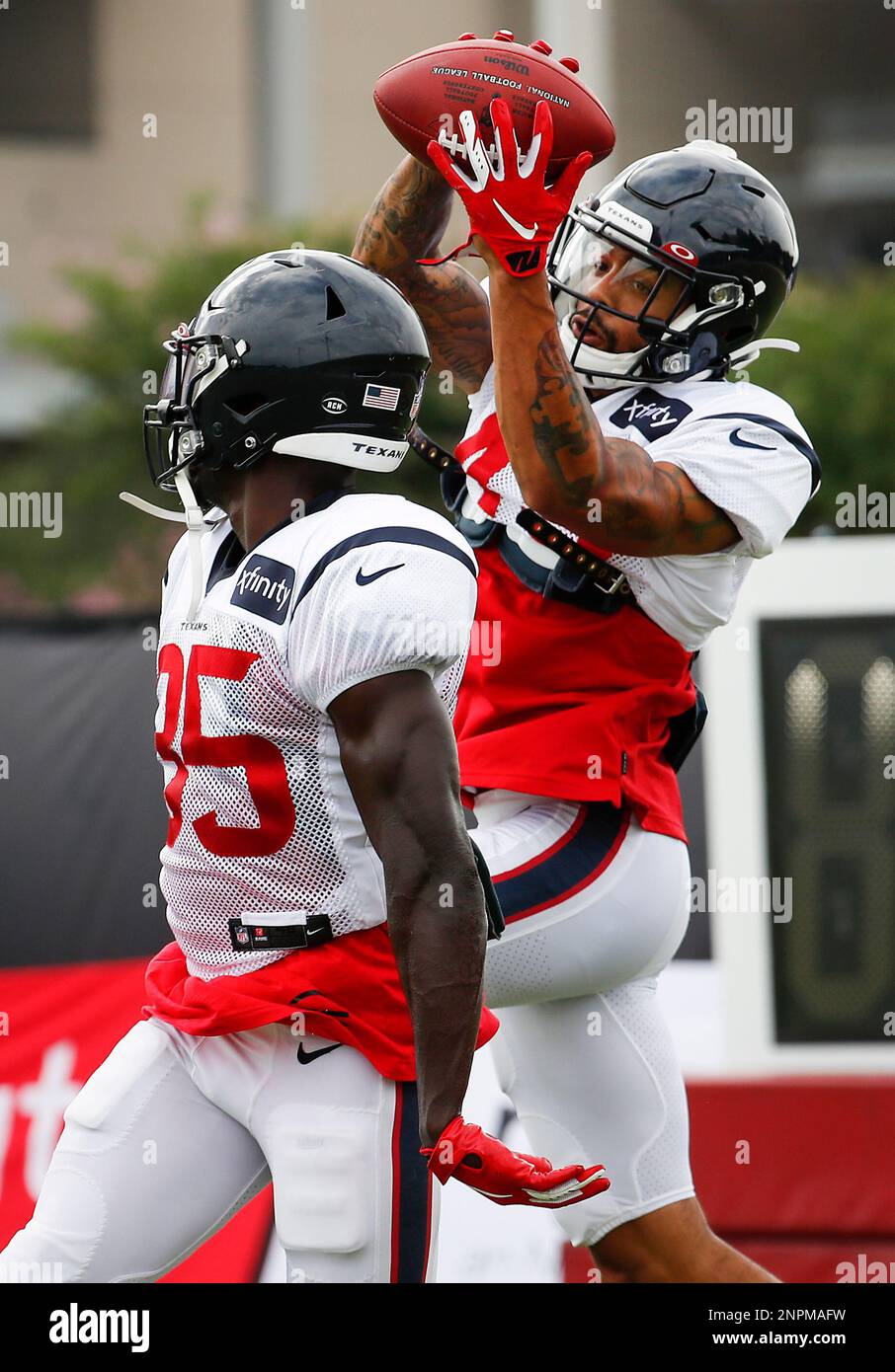 Houston Texans cornerback Anthony Chesley (43) leaps up over cornerback ...