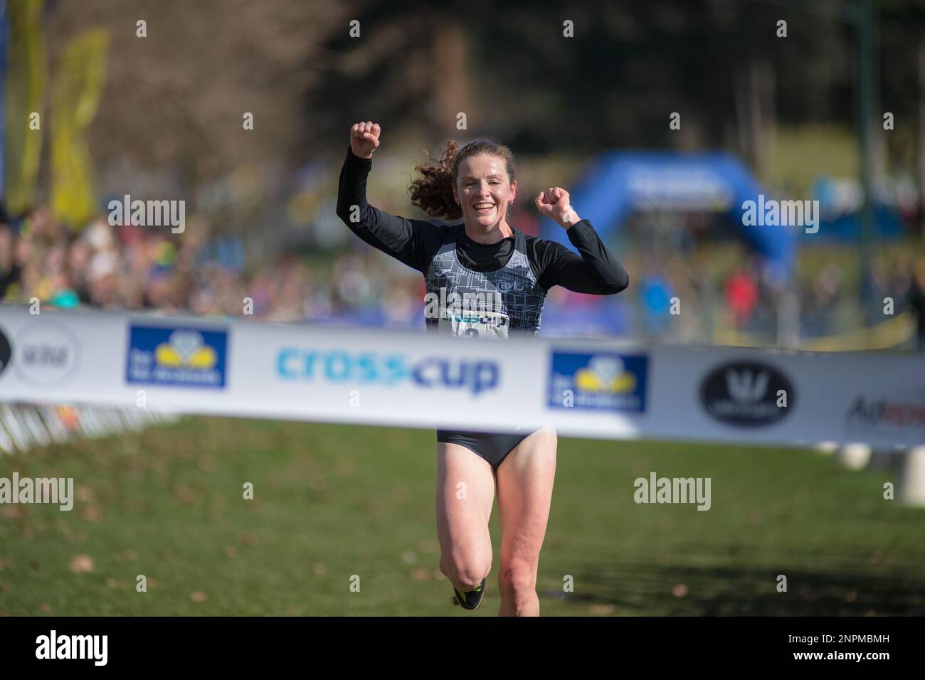 Belgian Lisa Rooms celebrates as she crosses the finish line to win the ...