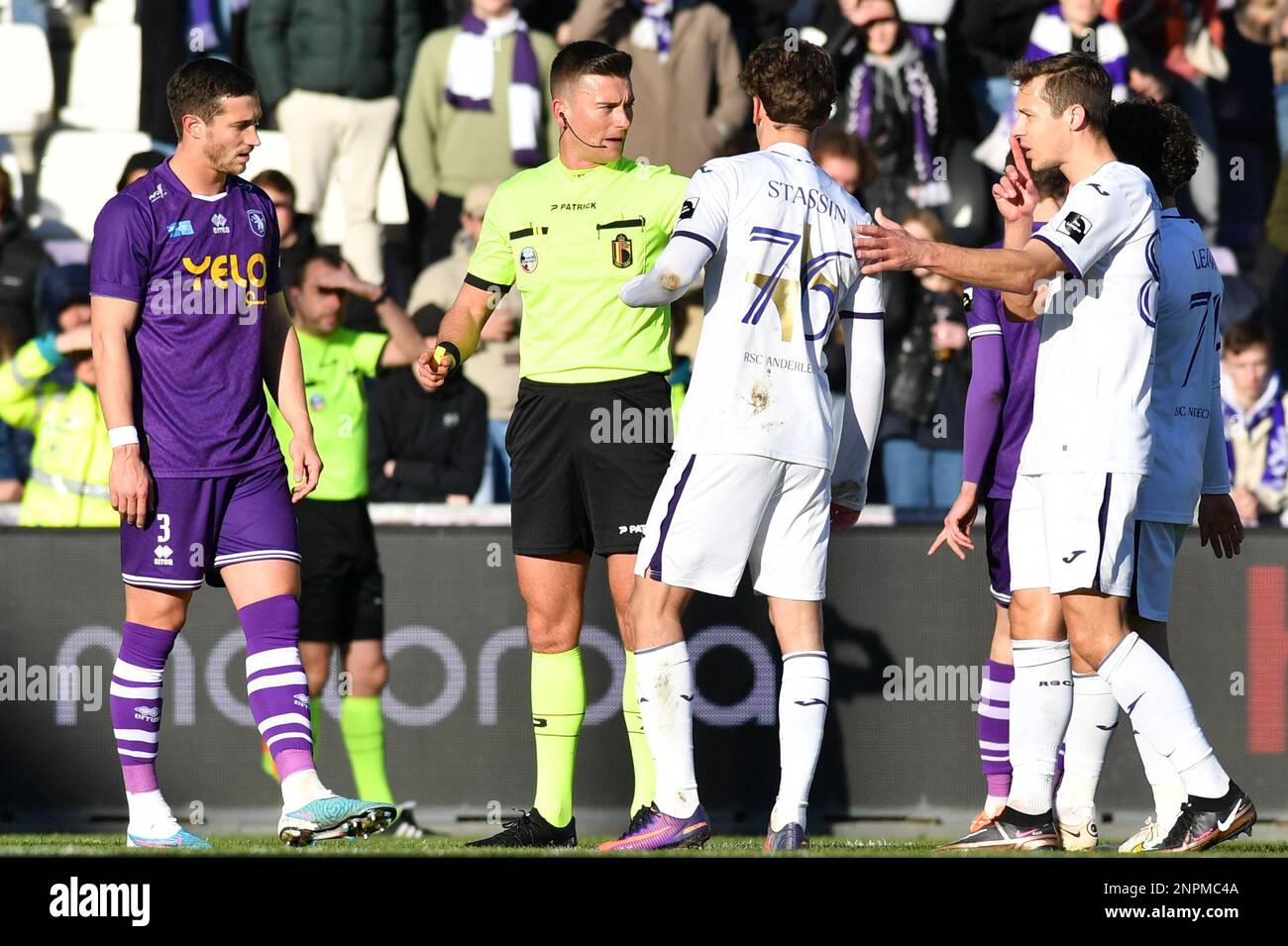 Beerschot's Herve Matthys, referee Wesli De Cremer, RSCA Futures' Lucas ...