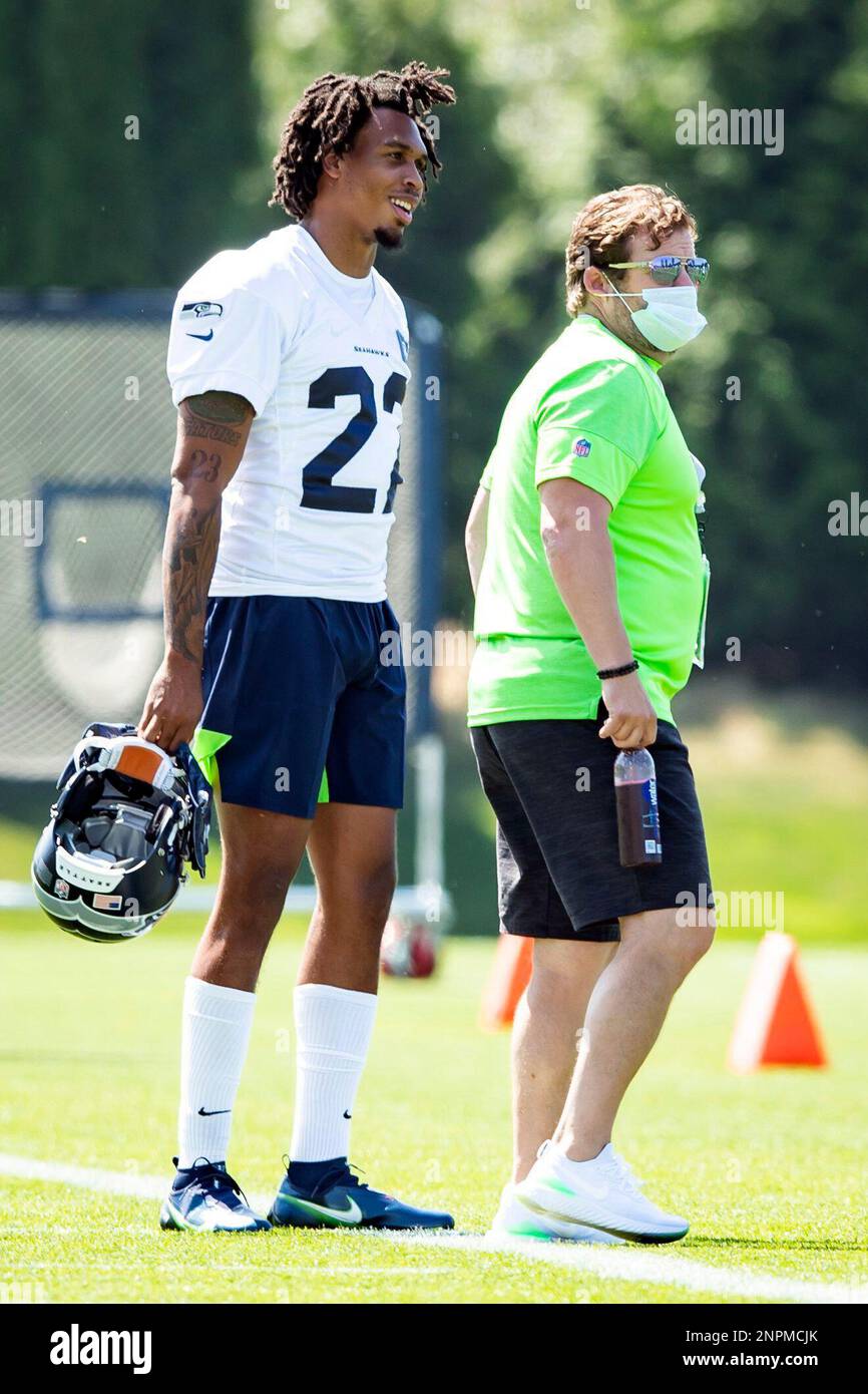Seahawks cornerback Quinton Dunbar, left, talks with general manager ...
