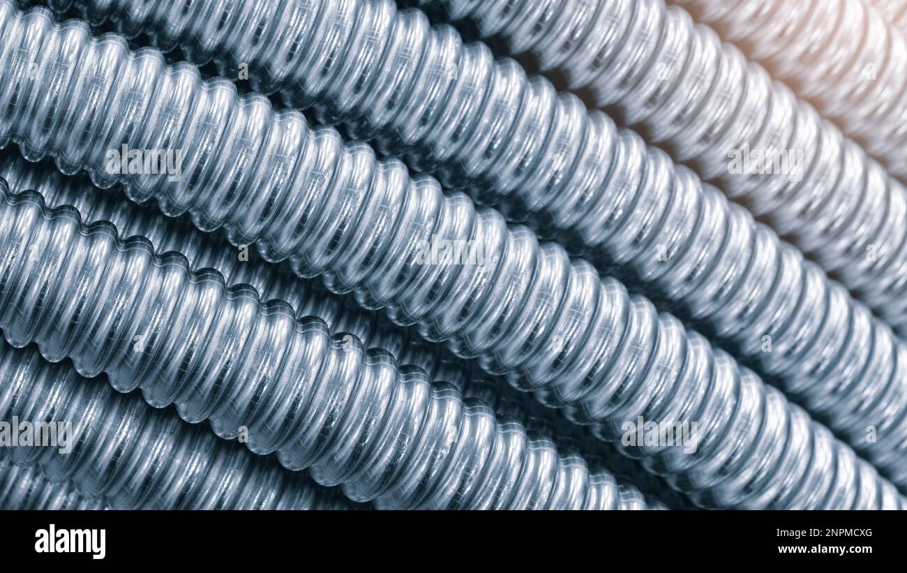 Stainless steel flexible pipes, close-up mackro. Industrial metal ...
