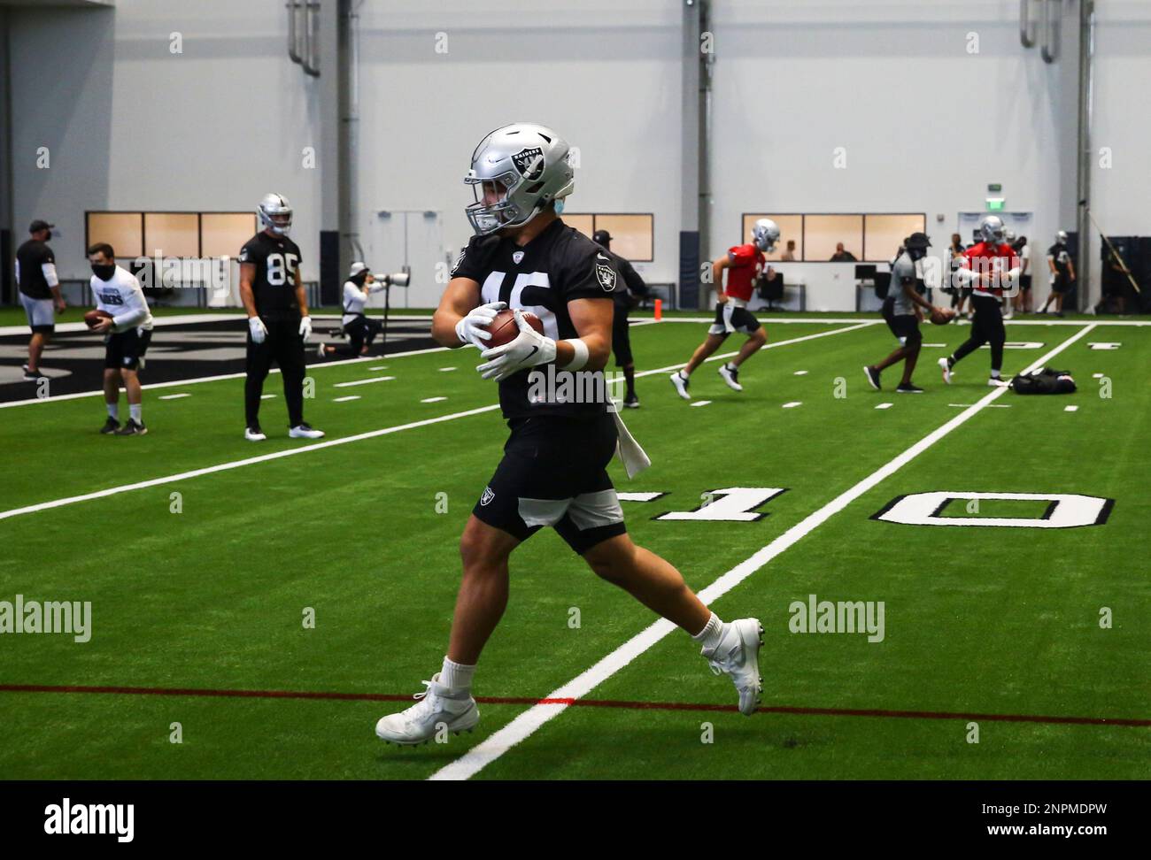 Las Vegas Raiders fullback Alec Ingold (45) catches a ball during an ...