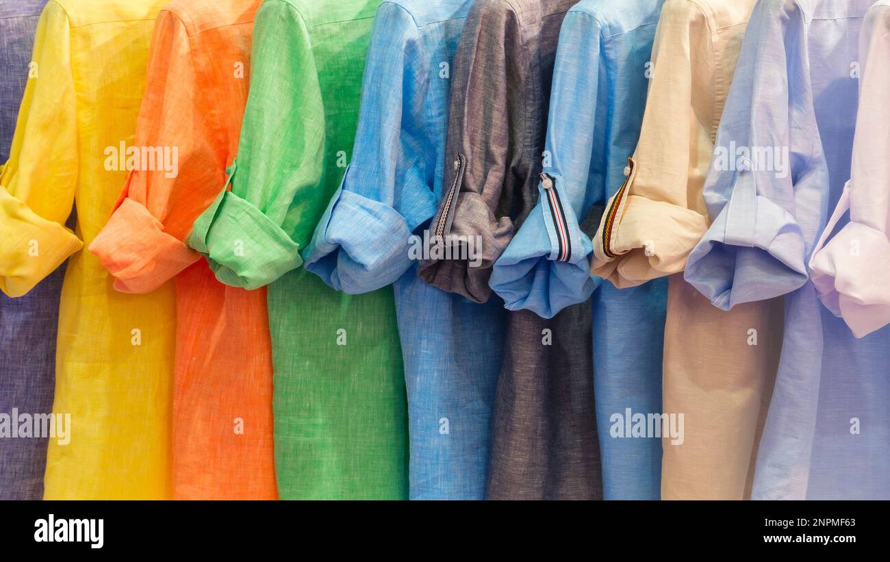 linen shirts, Fashion clothes on clothing rack - bright colorful closet ...