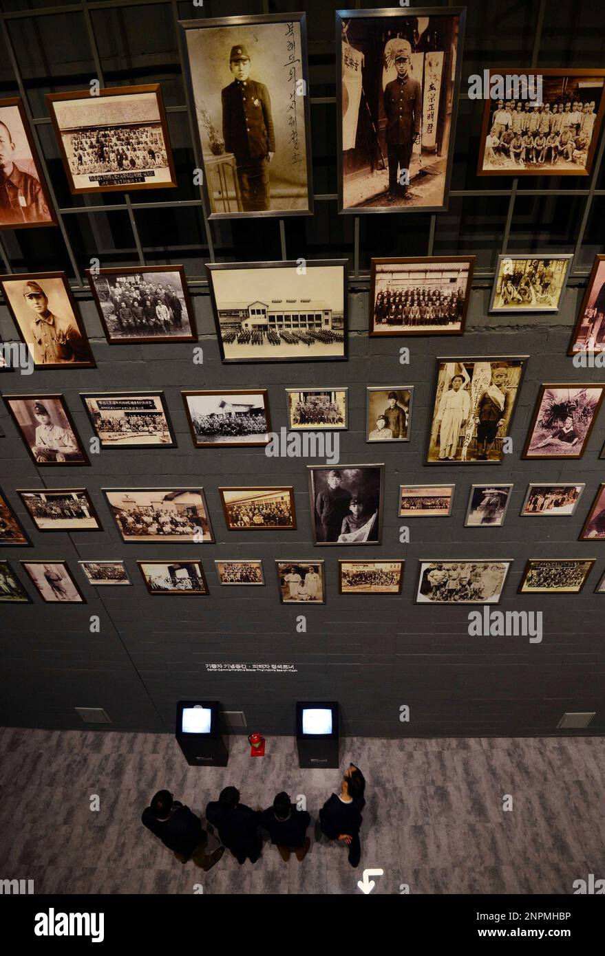 In this Dec. 10, 2015, photo, photos of victims of forced labor during ...