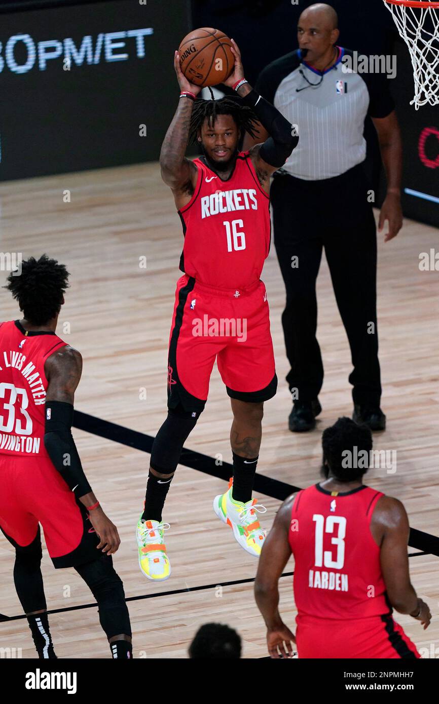 Houston Rockets' Ben McLemore (16) passes against the Philadelphia ...