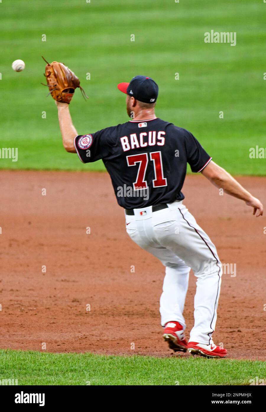 BALTIMORE, MD - AUGUST 14: Washington Nationals pitcher Dakota Bacus (71) makes his major league ...