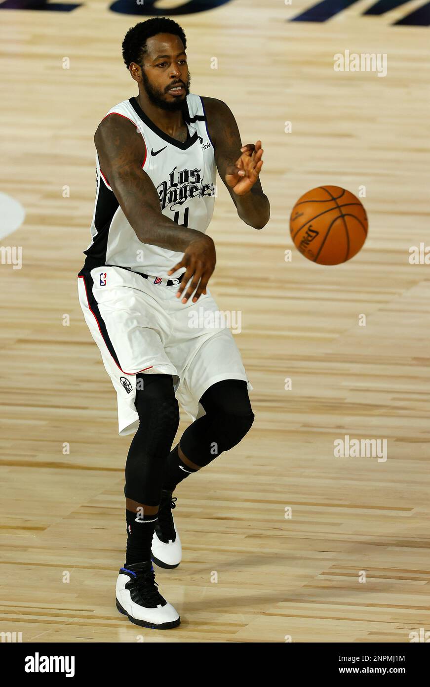 Los Angeles Clippers' JaMychal Green passes the ball during the fourth ...