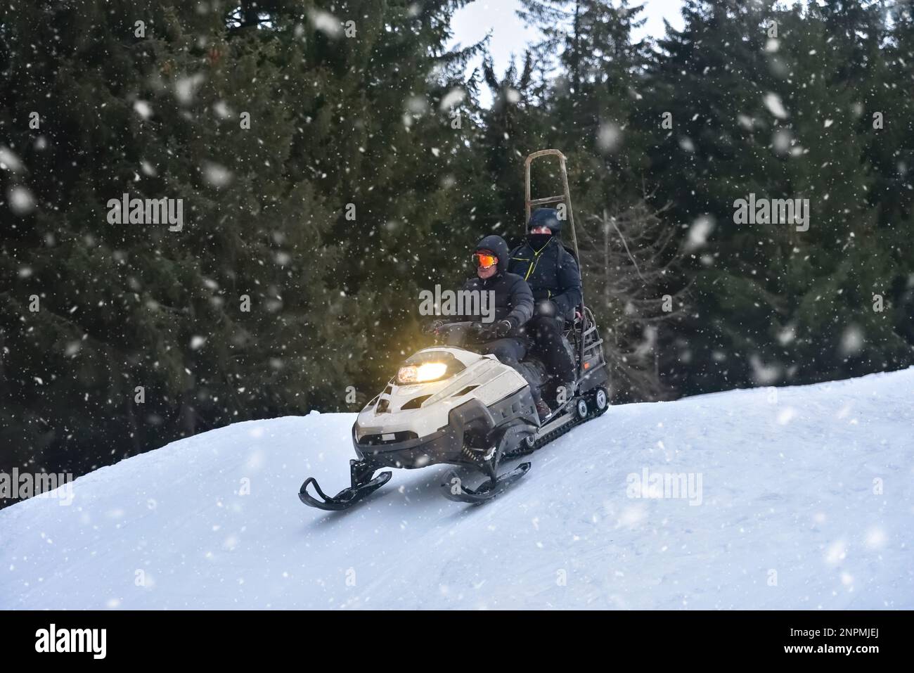 Snowmobile motion snowmobiling hi-res stock photography and images - Alamy