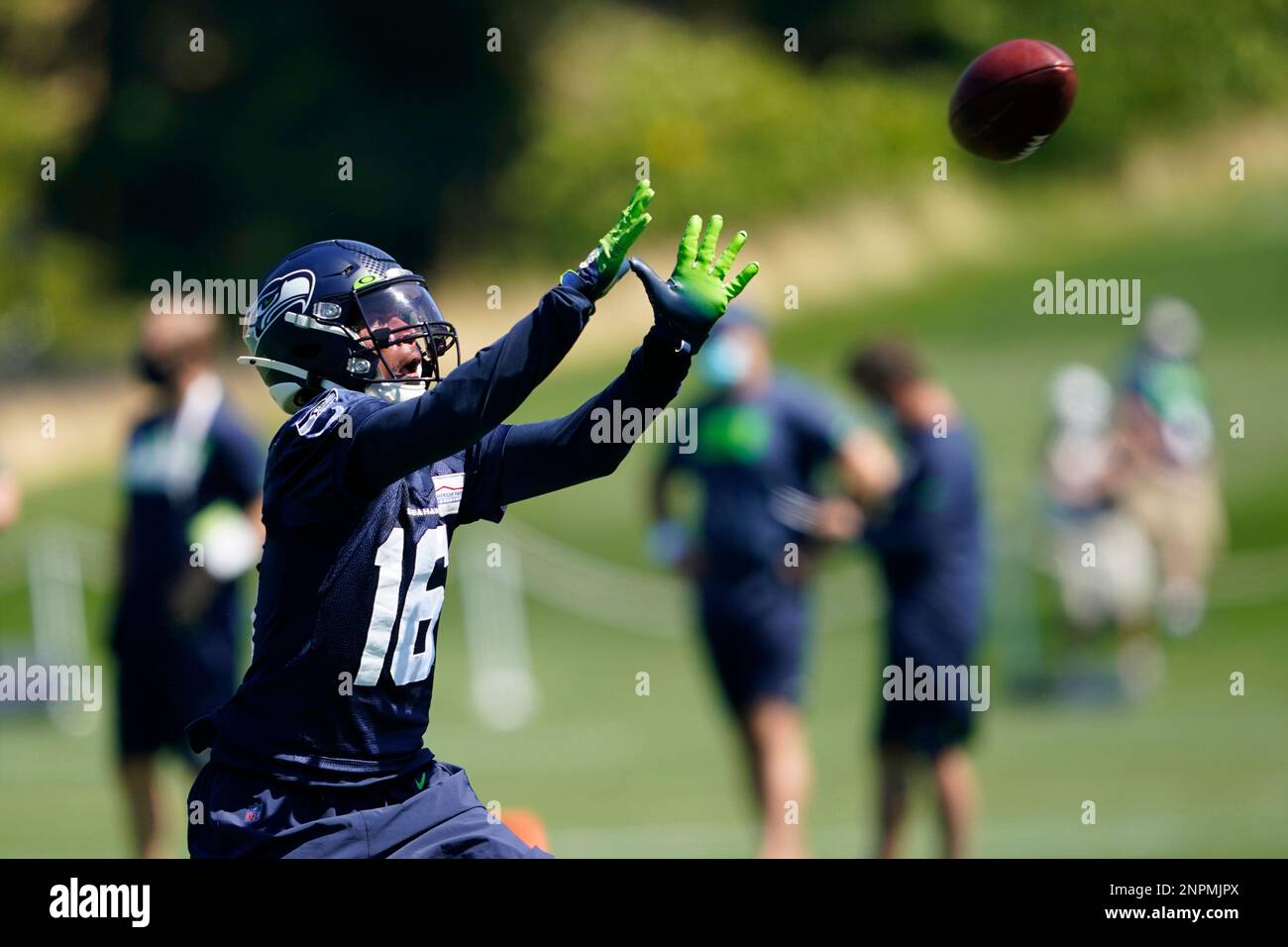 Seattle Seahawks wide receiver Tyler Lockett makes a catch during a ...
