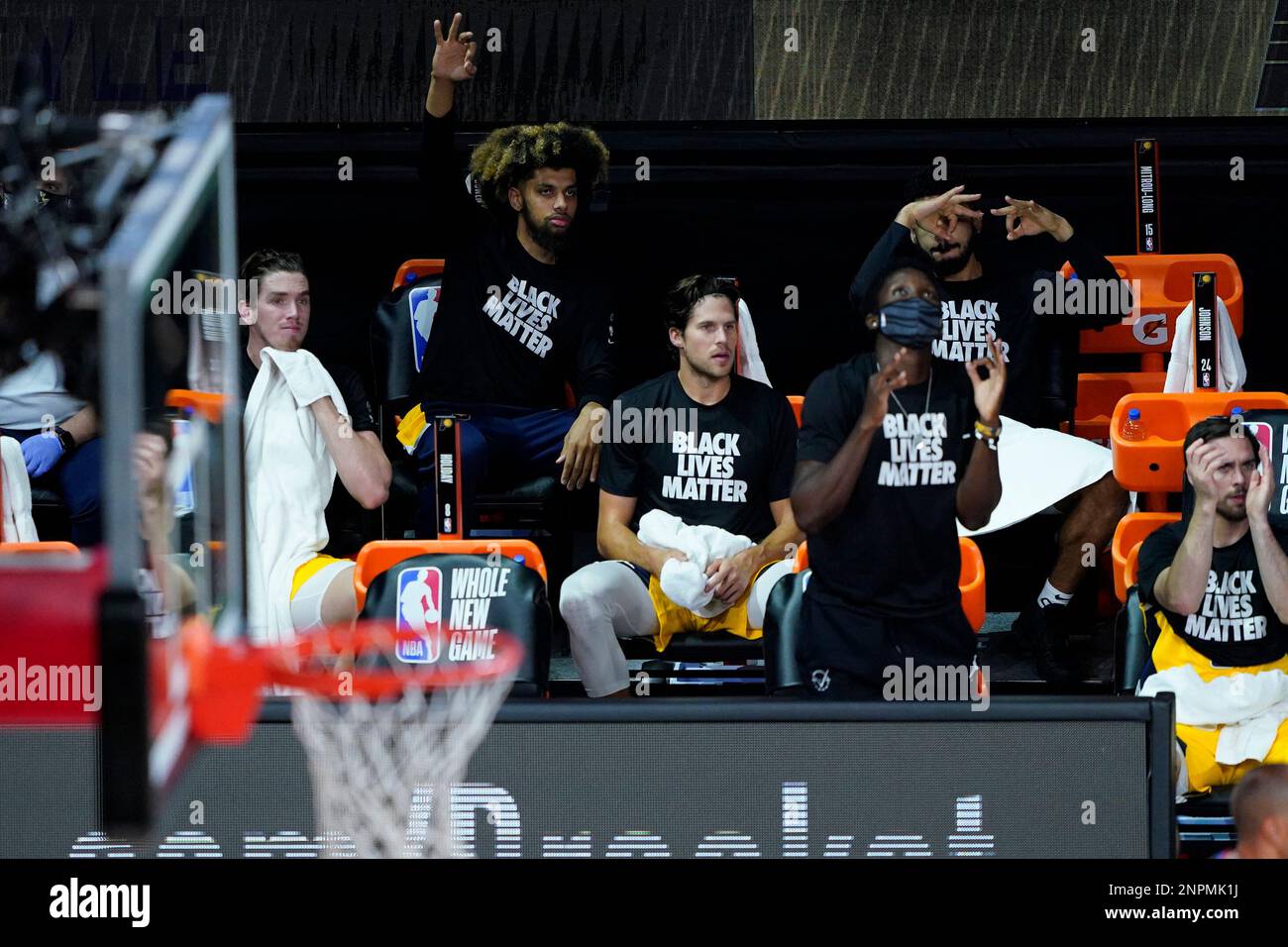 Indiana Pacers players signal three pointer from the bench during the ...