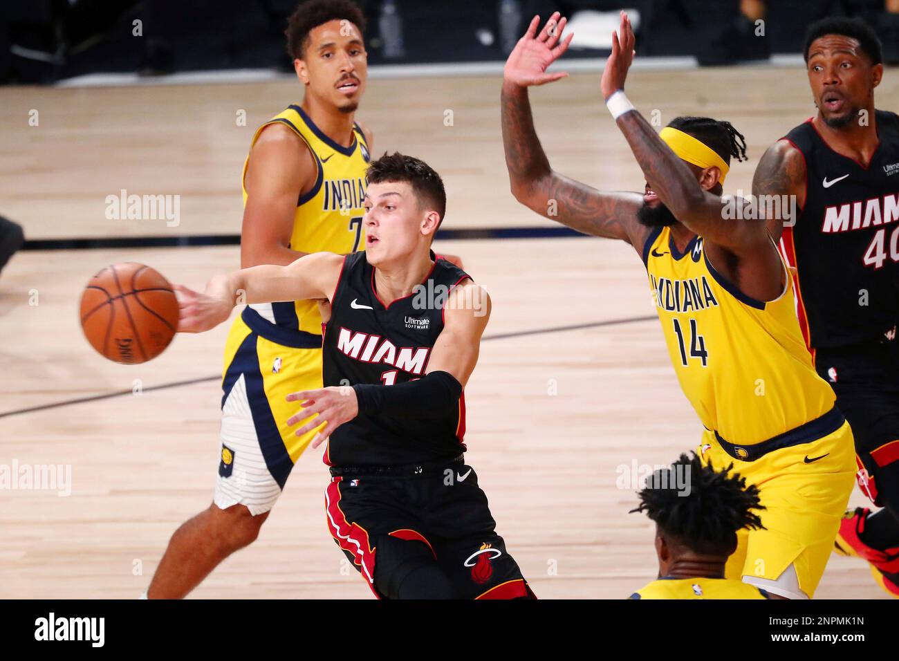 Miami Heat guard Tyler Herro (14) passes while defended by Indiana ...