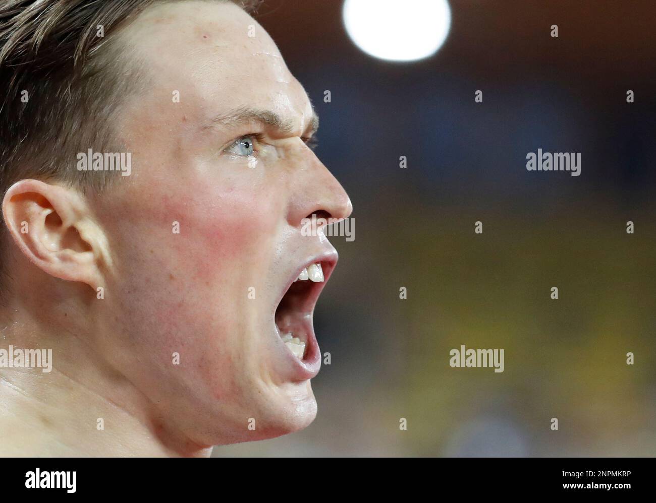 Norway's Karsten Warholm shouts out as he celebrates after winning the ...