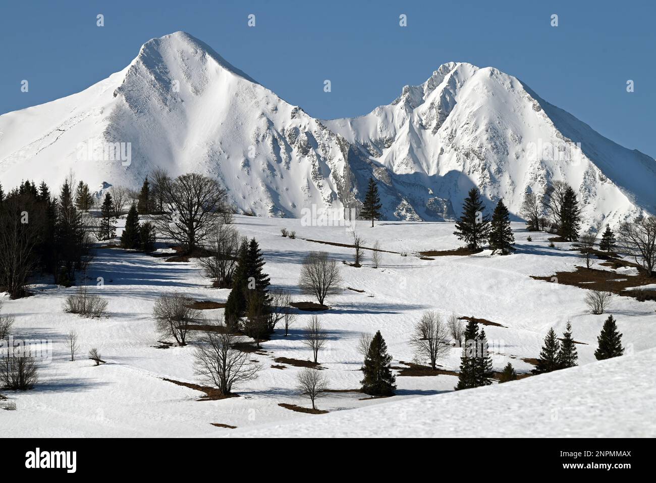 Scenic view of Belianske Tatry mountain range covered in snow, with ...