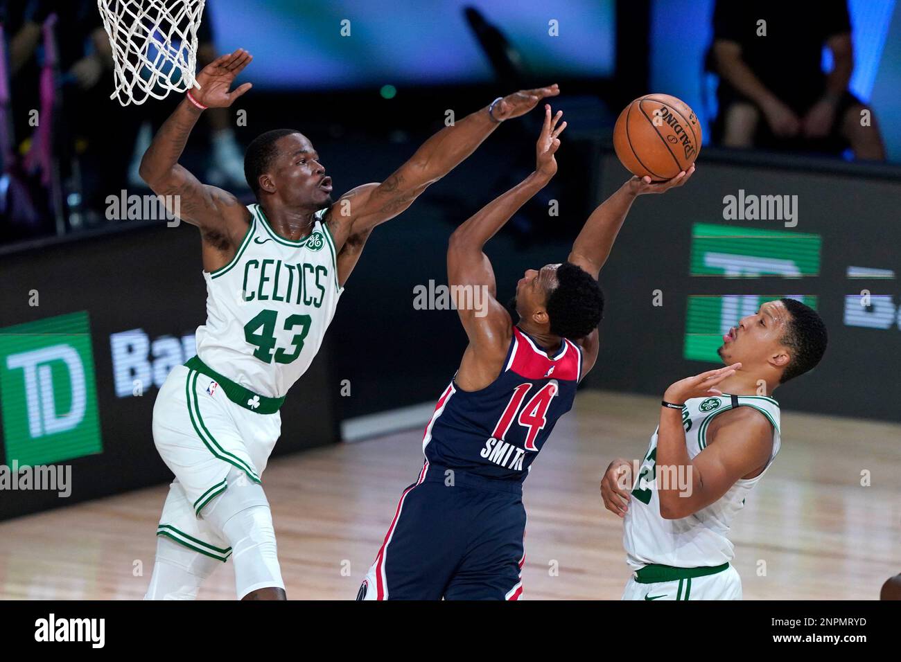 Washington Wizards' Ish Smith (14) shoots as Boston Celtics' Javonte ...
