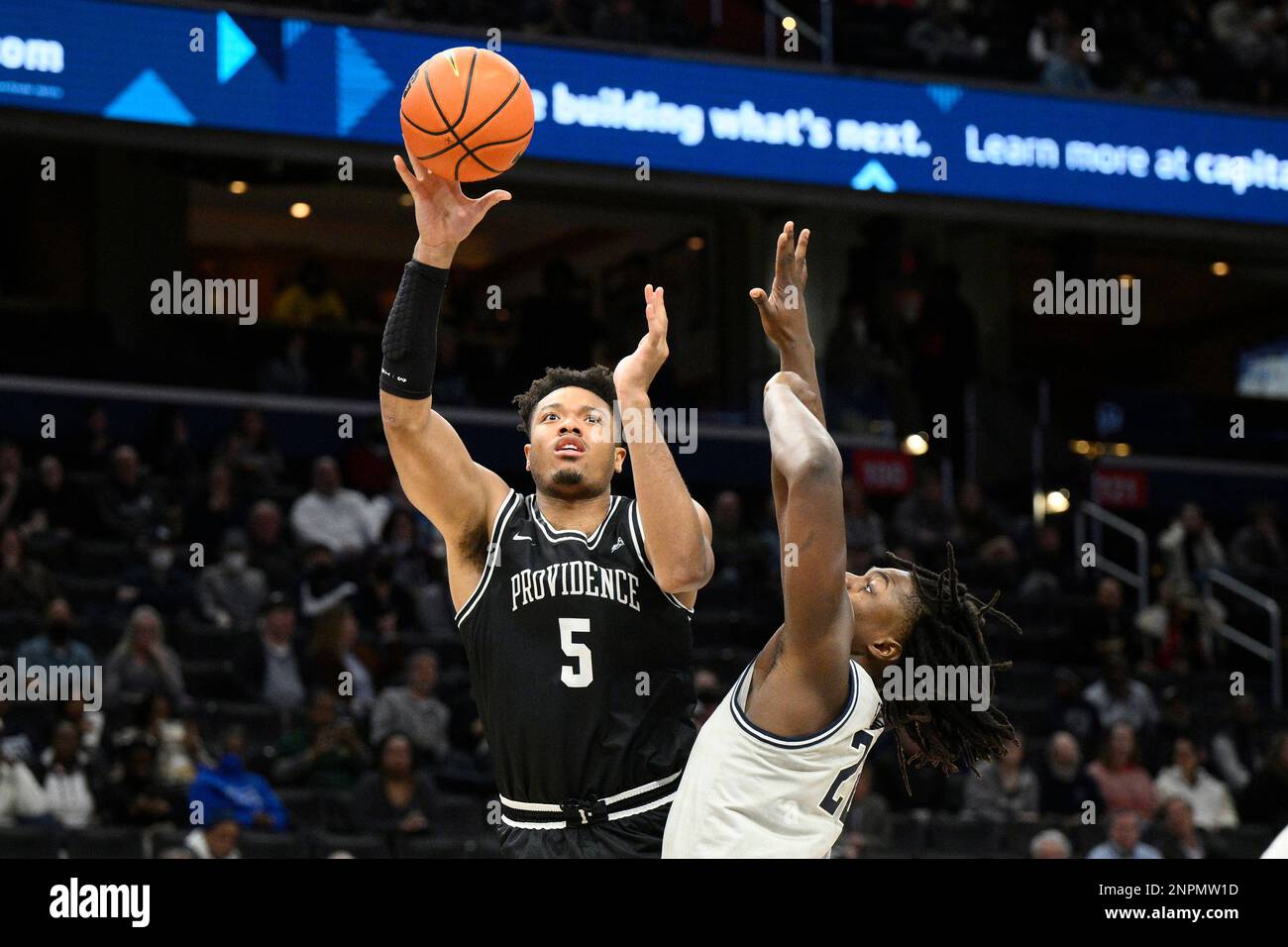 Providence forward Ed Croswell (5) goes to the basket against ...