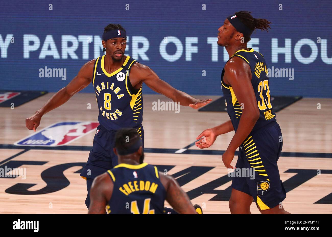 Indiana Pacers forward Justin Holiday (8) celebrates with center Myles ...