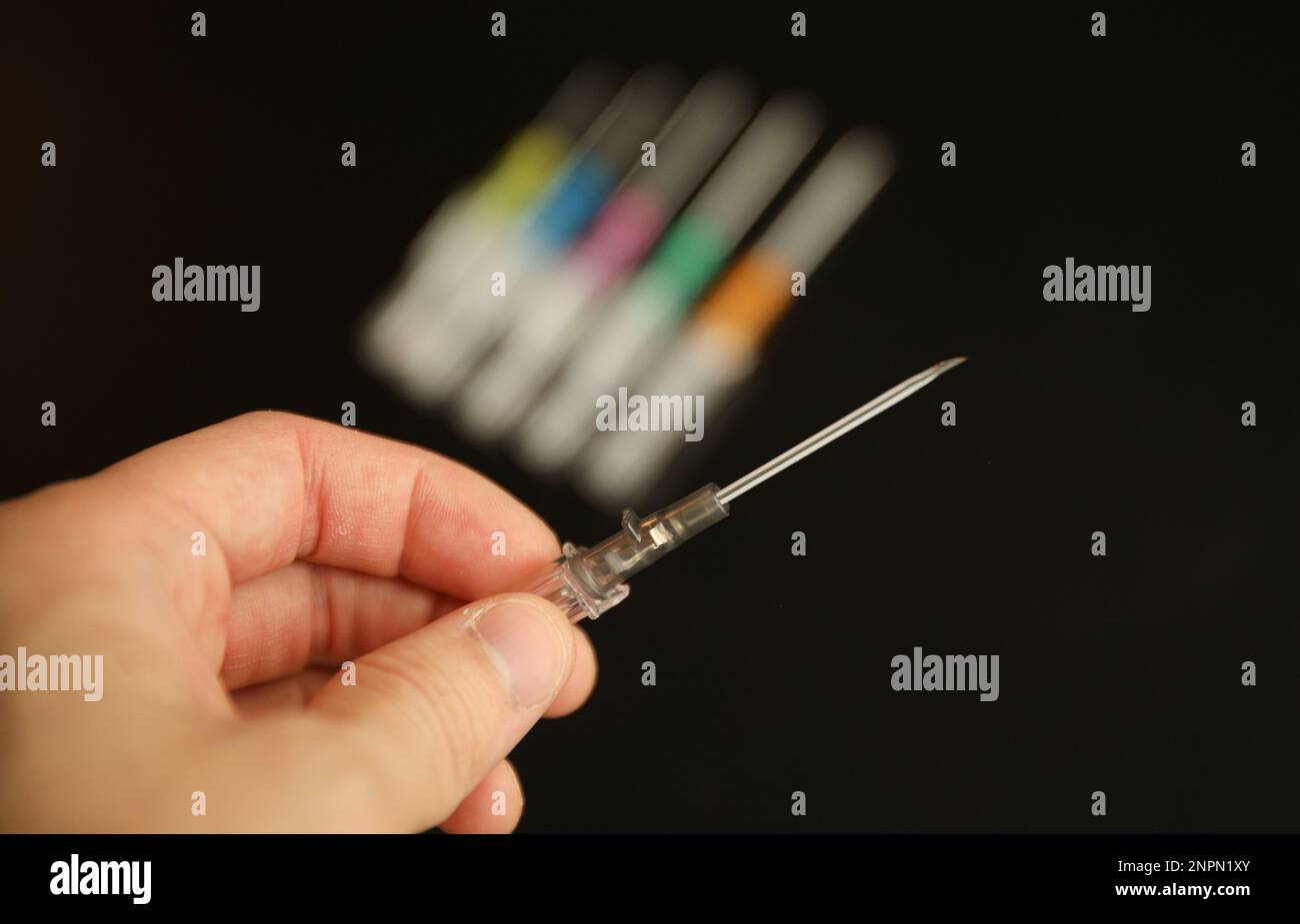 flu vaccine and needle syringes showing opioid crisis needle therapy ...