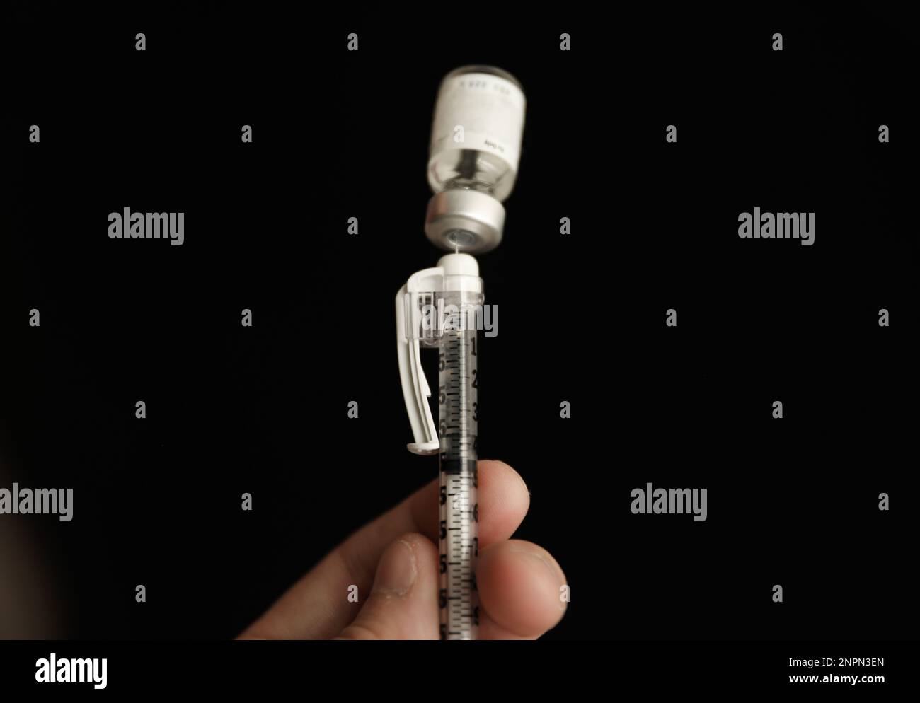 flu vaccine and needle syringes showing opioid crisis needle therapy ...