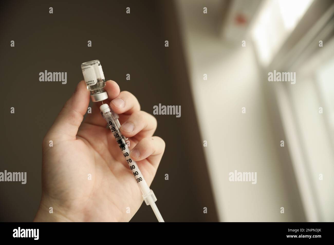 flu vaccine and needle syringes showing opioid crisis needle therapy ...