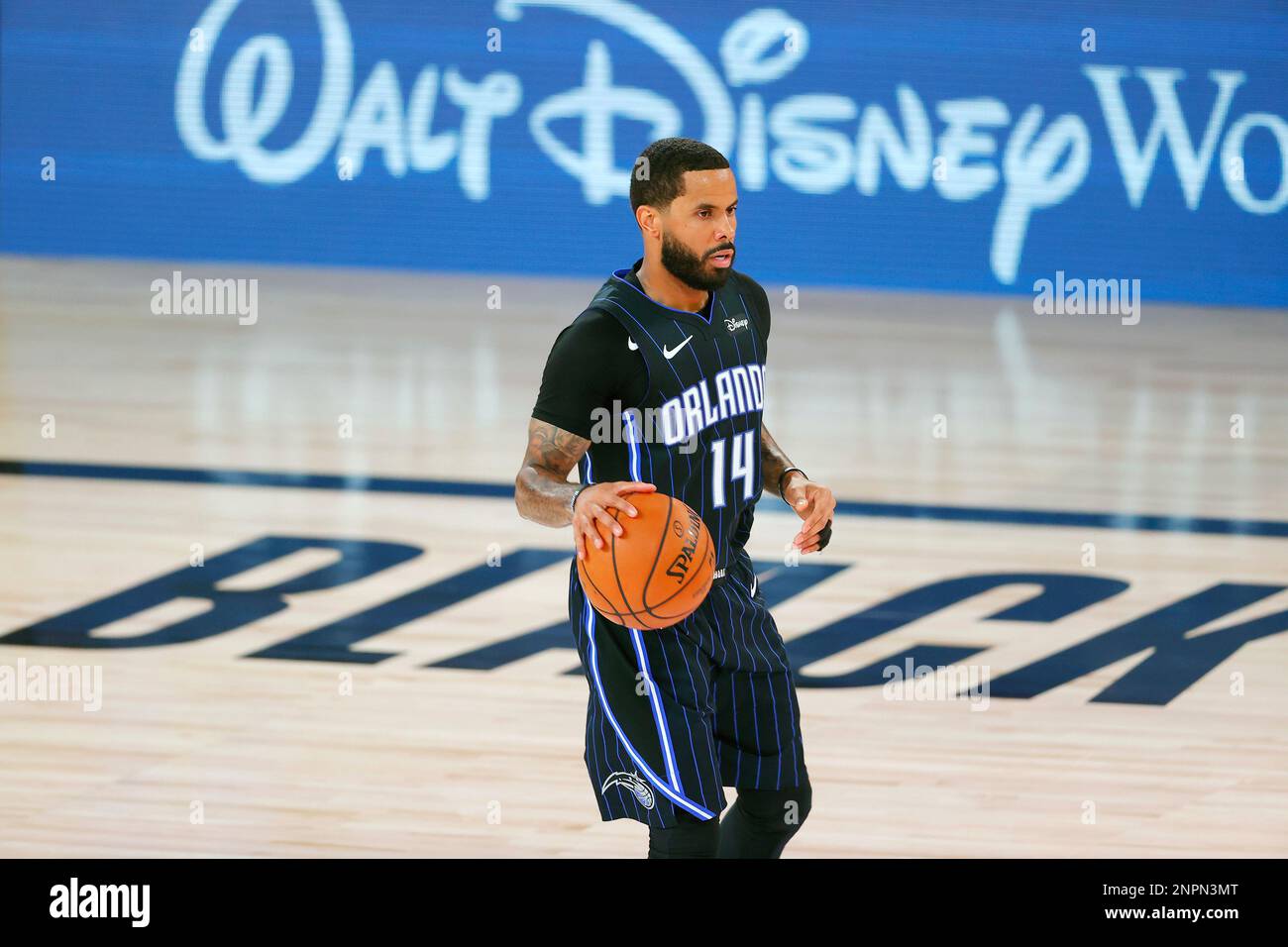 Orlando Magic's D.J. Augustin brings the ball up court against the ...