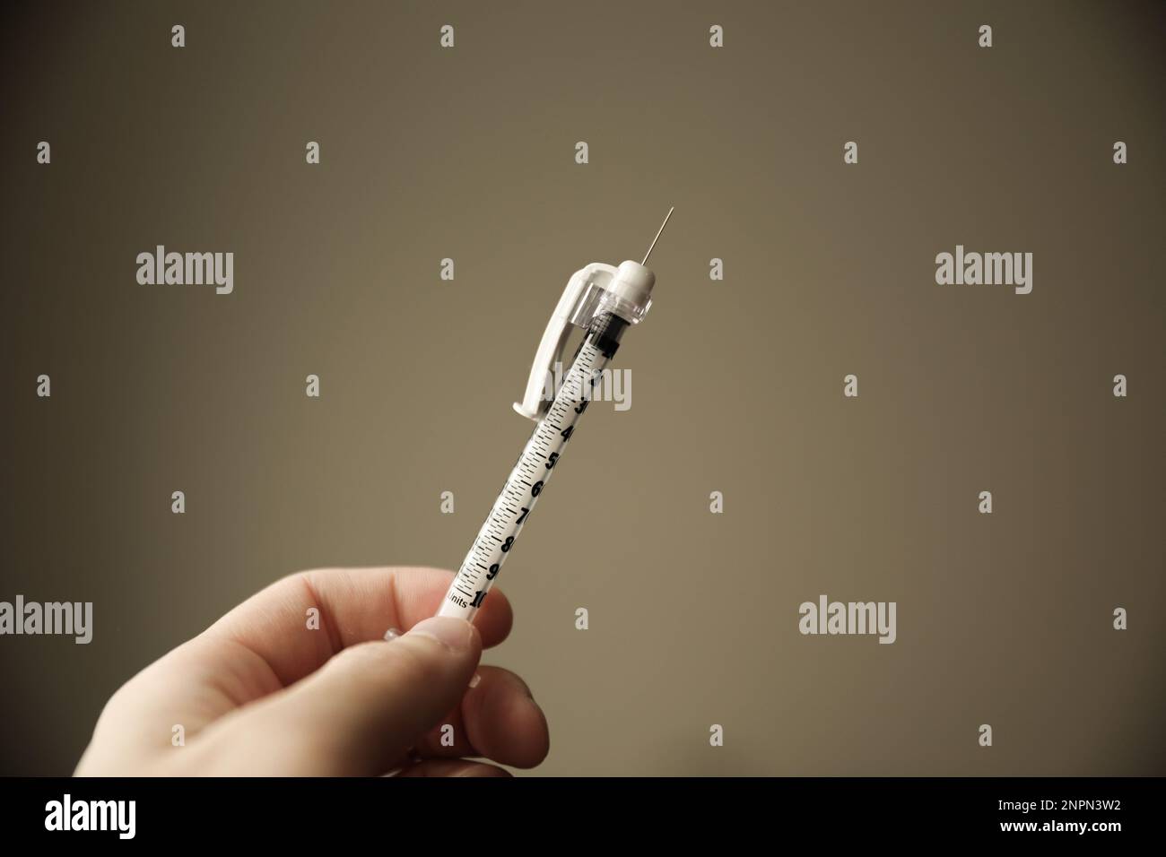 flu vaccine and needle syringes showing opioid crisis needle therapy ...