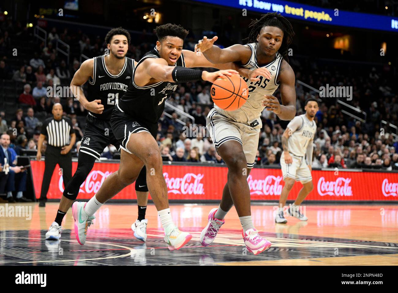 Providence forward Ed Croswell (5) and Georgetown forward Bradley ...