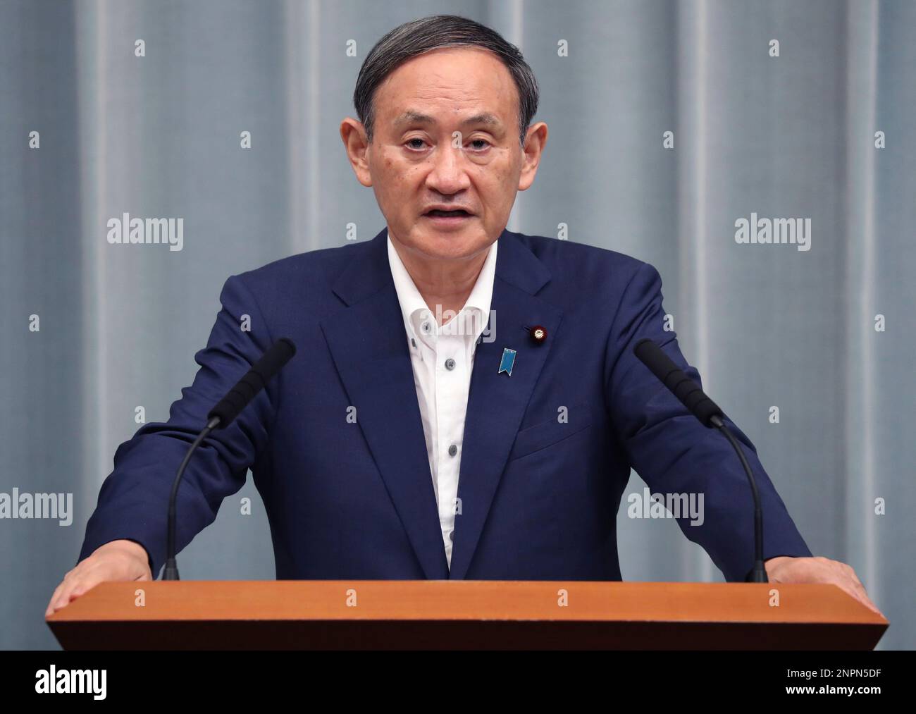 Japan's Chief Cabinet Secretary Yoshihide Suga attends a press ...