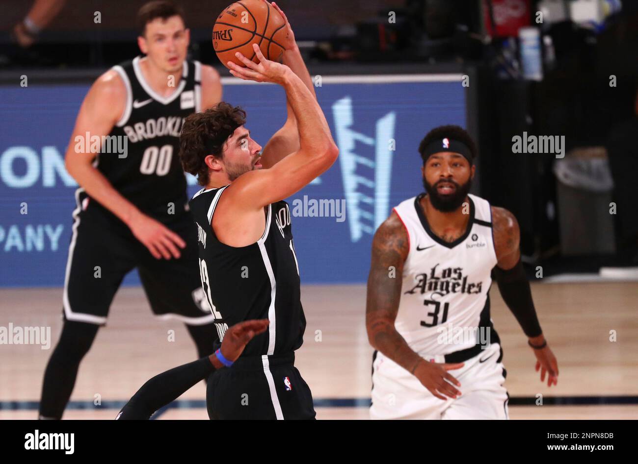 Brooklyn Nets forward Joe Harris (12) shoots against the Los Angeles ...