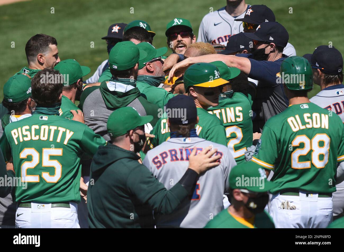 OAKLAND, CA - AUGUST 09: Players and coaches from both sides clash ...