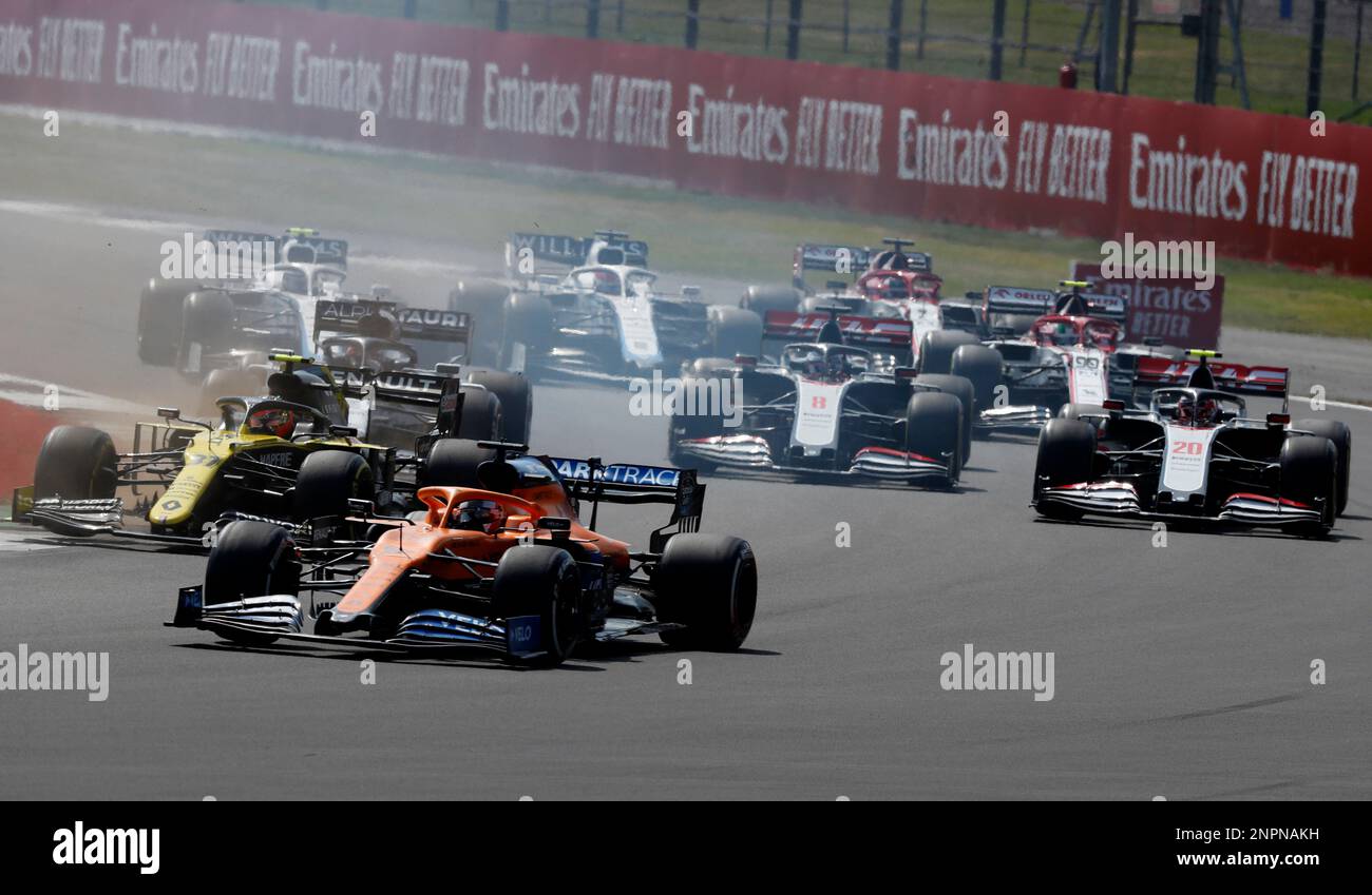 Drivers take the first corner at the start of the 70th Anniversary ...