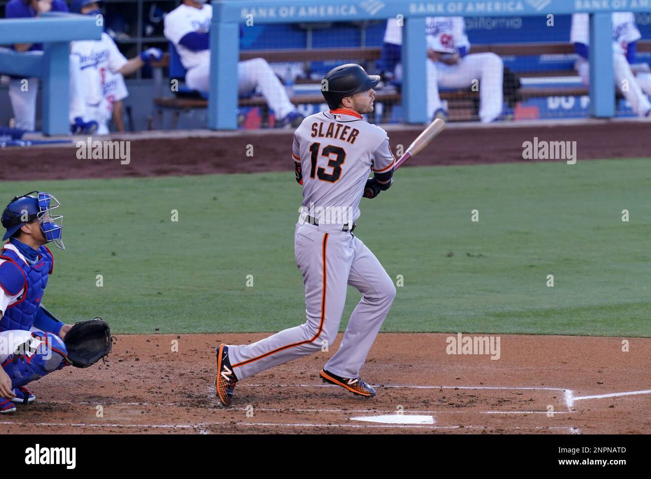 San Francisco Giants right fielder Austin Slater (13) follows through ...