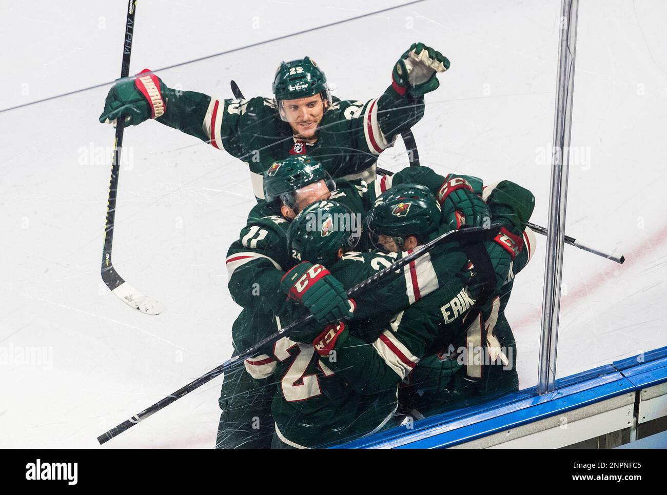 Minnesota Wild players celebrate a goal against the Vancouver Canucks ...