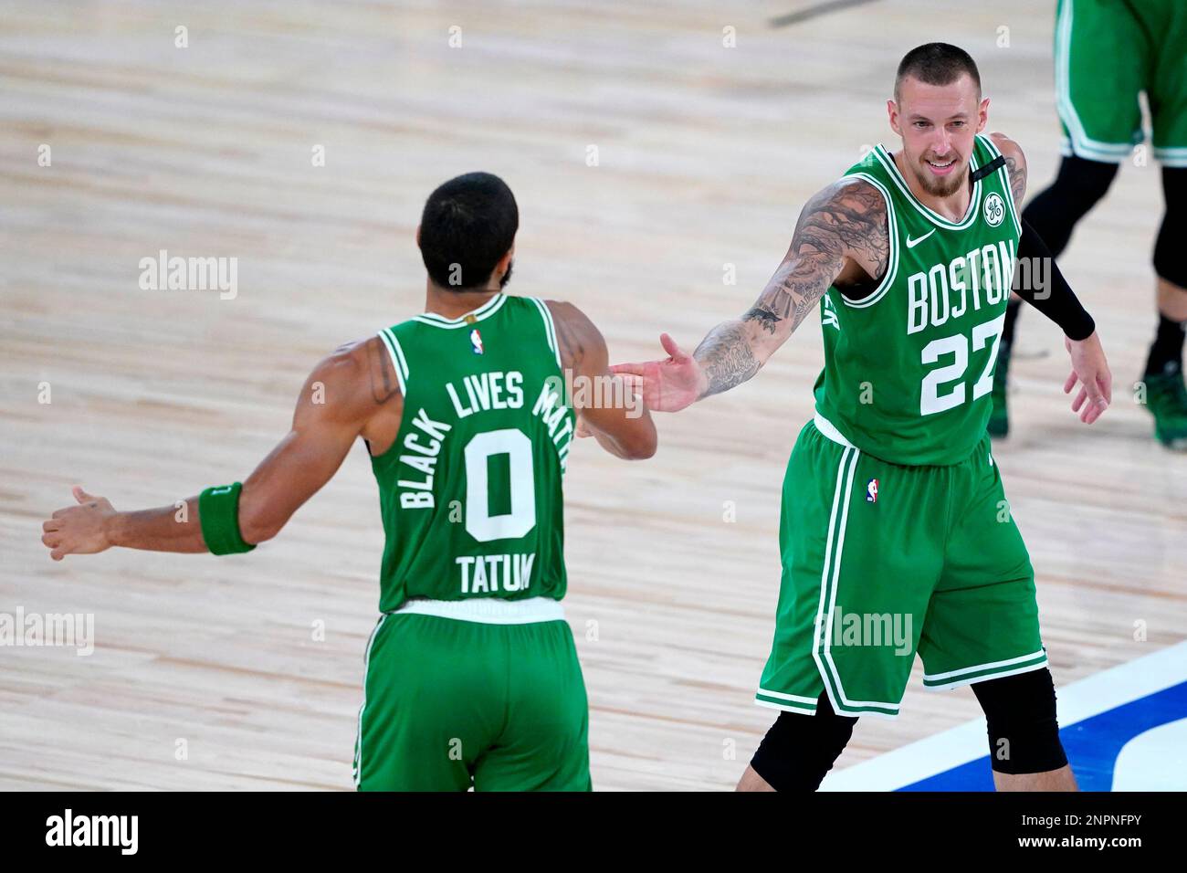 Boston Celtics' Jayson Tatum (0) celebrates his three-pointer with ...