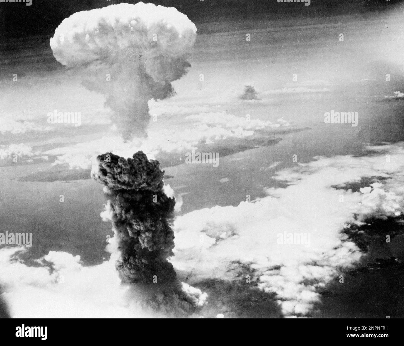 FILE - In this Aug. 9, 1945, file photo, a giant column of smoke rises ...