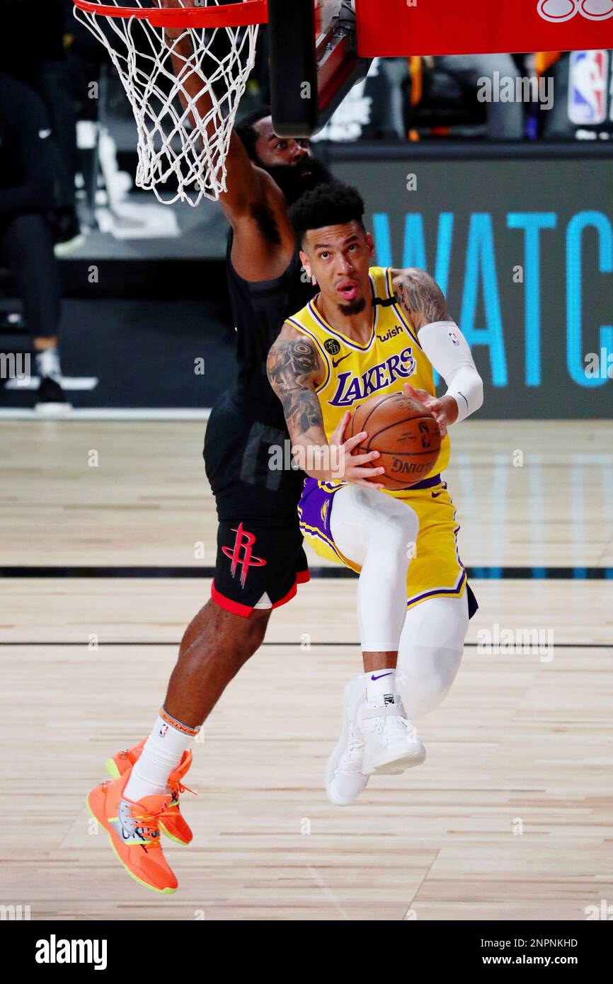 Los Angeles Lakers forward Kyle Kuzma, right, leaps to shoot while ...