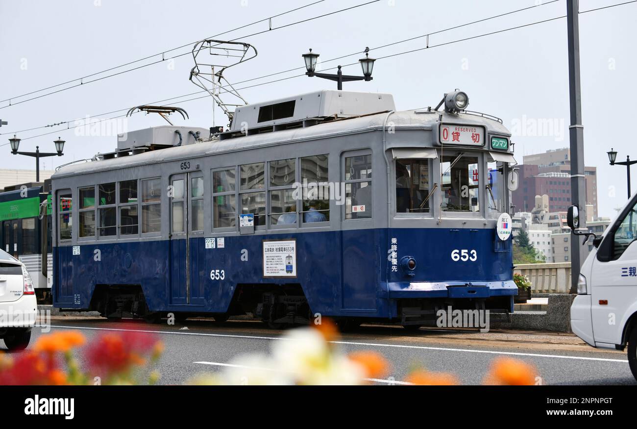 Hiroshima Electric Railway No.653 (A-bomb train) made in 1942 runs near ...