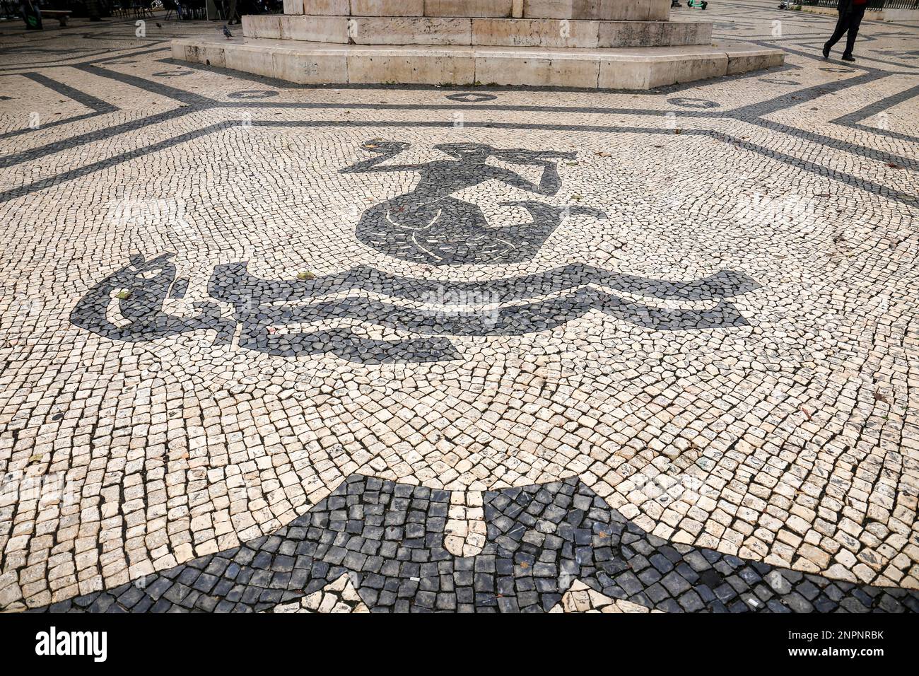 Beautiful Cobblestone pavement of Camoes Square in Lisbon, Portugal ...