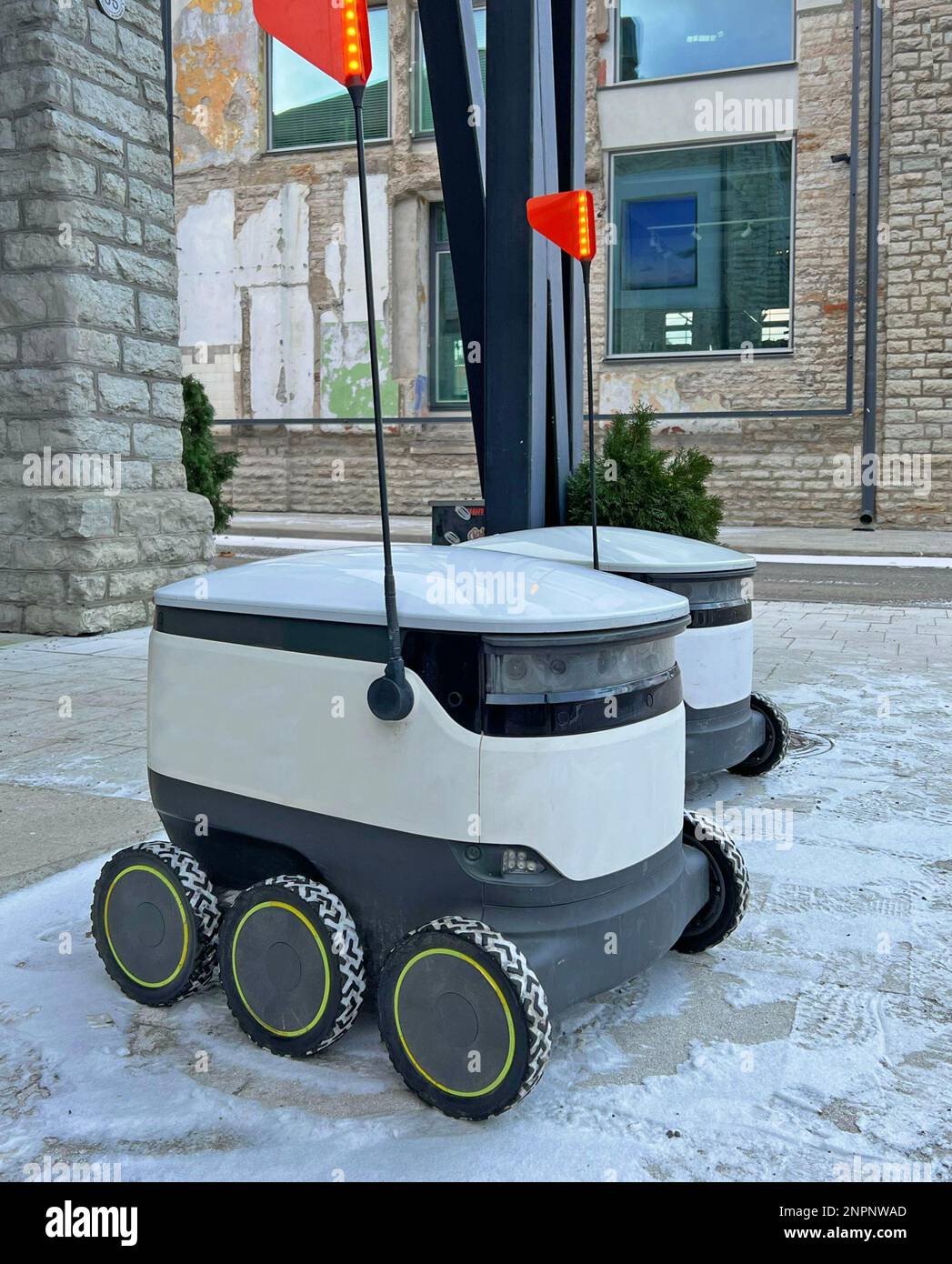 Autonomous delivery robot waiting for order at cafe or restaurant ...