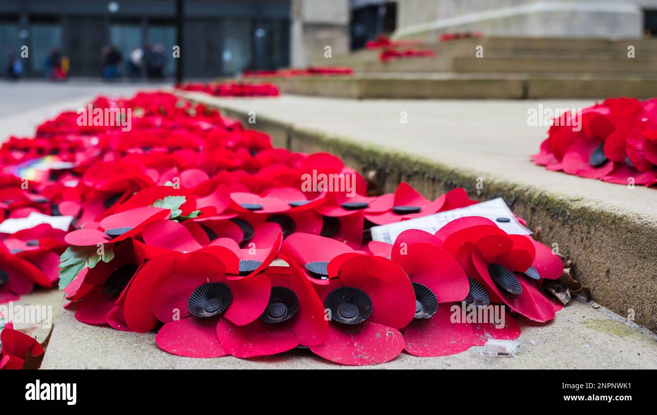 Close up poppy wreaths left around the Cenotaph in Manchester city ...