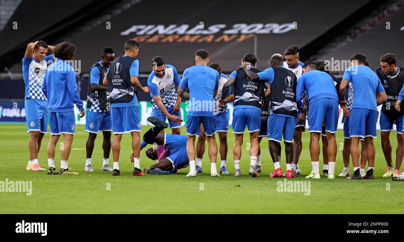 Getafe's Allan Nyom rolling between his teammates on the pitch during ...