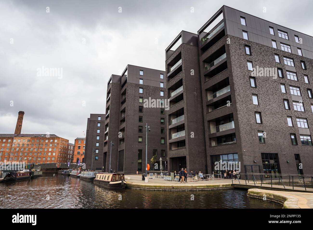 The modern three buildings at Cotton Field Wharf seen towering above ...