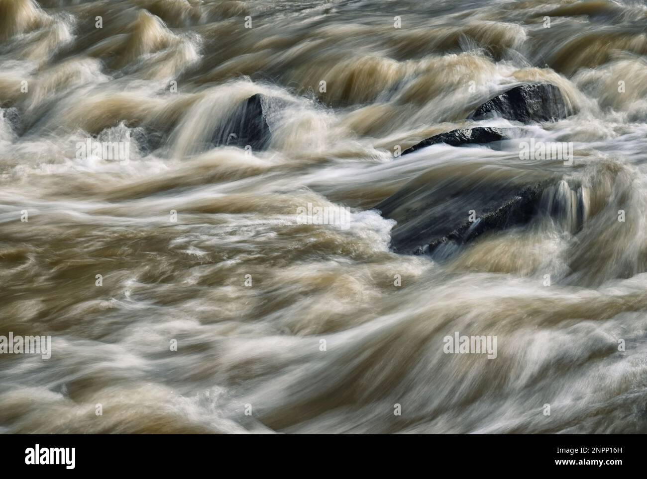 abstract nature background Detail of wild muddy river with rapids Stock ...
